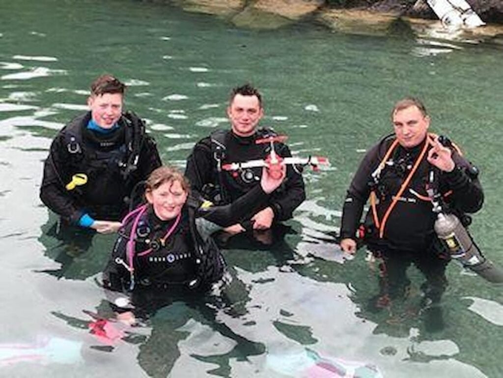 11-year-old diver completes underwater Lego challenge